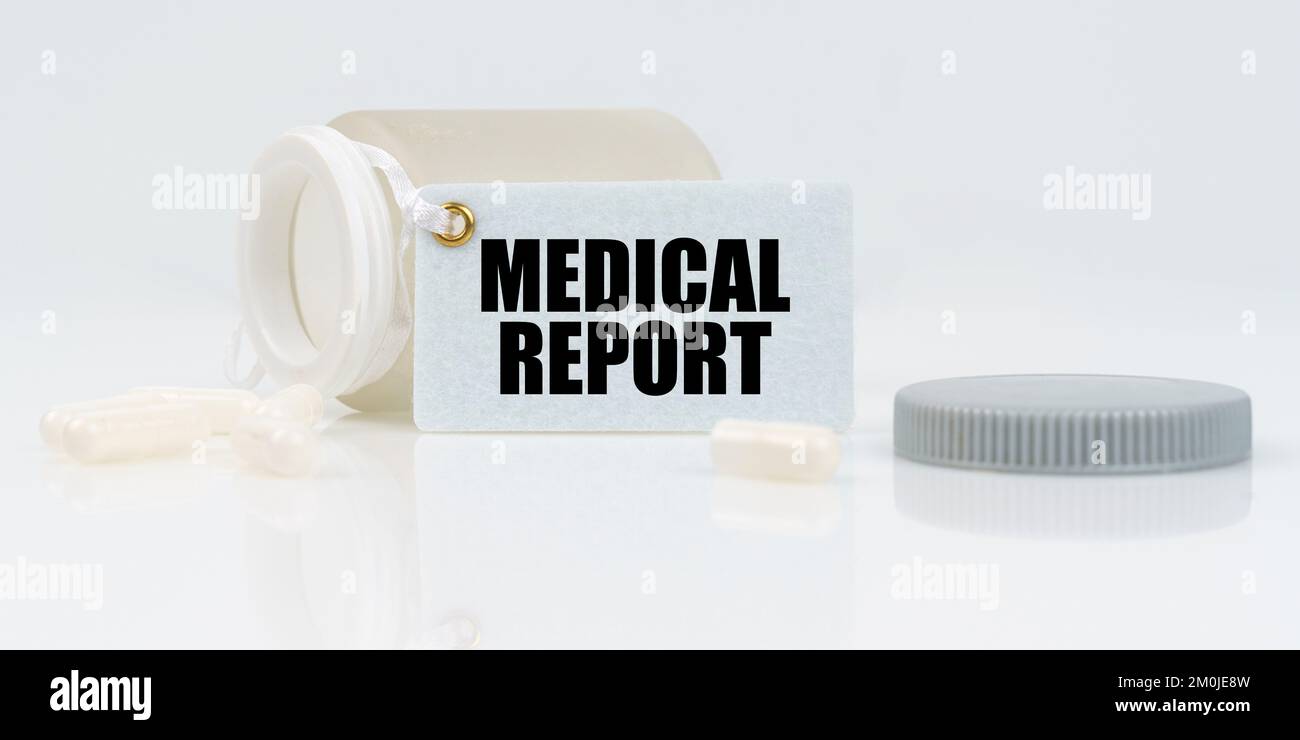 Medicine and health concept. On a white reflective background, there ...