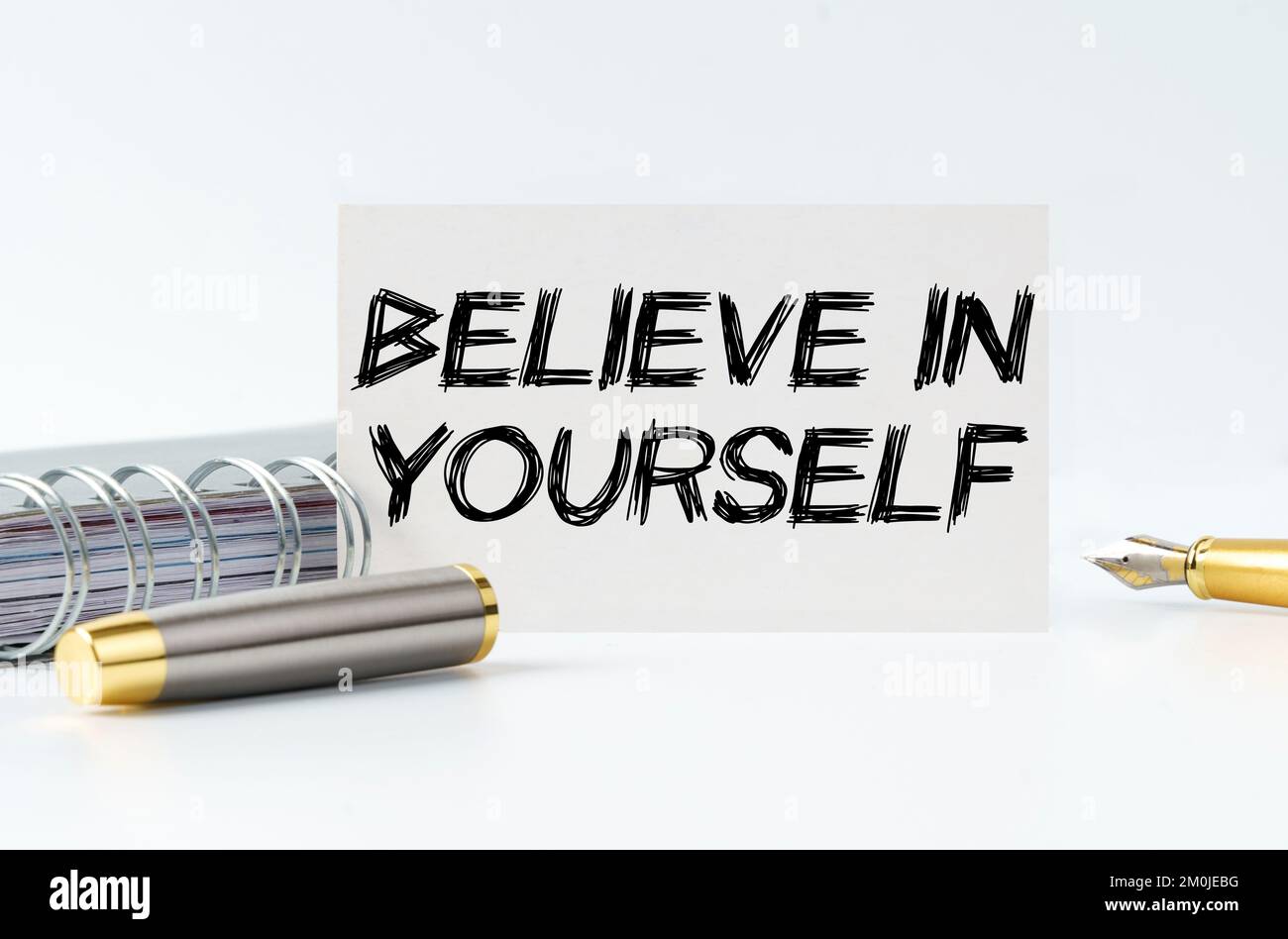 Business and finance concept. On the table is a notebook, a pen and a ...