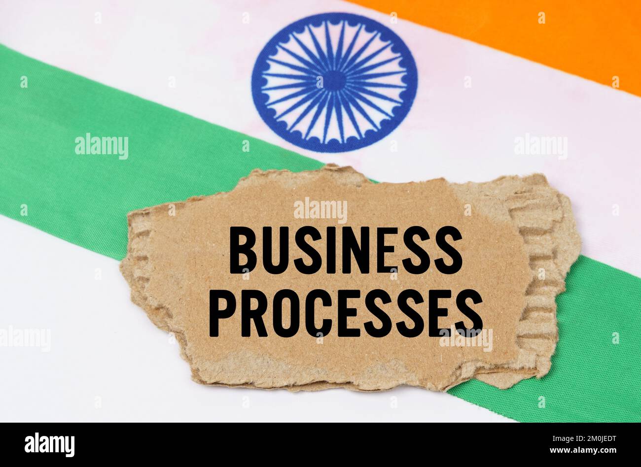 Business and finance concept. The Indian flag has a cardboard box with ...
