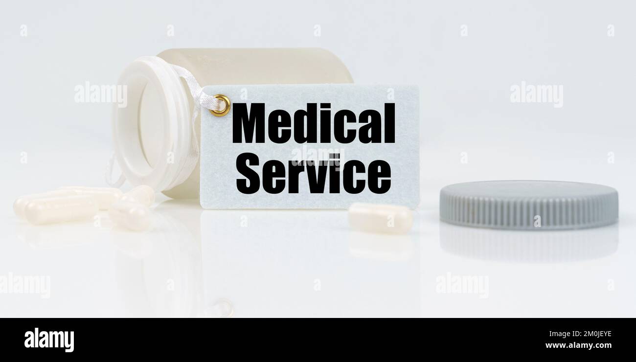 Medicine and health concept. On a white reflective background, there ...