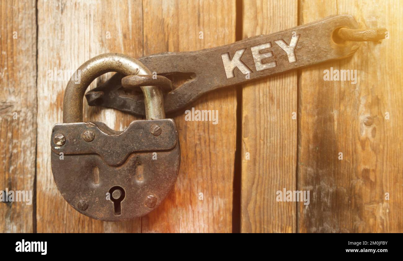 Security concept. There is a lock on the door on the metal part of ...
