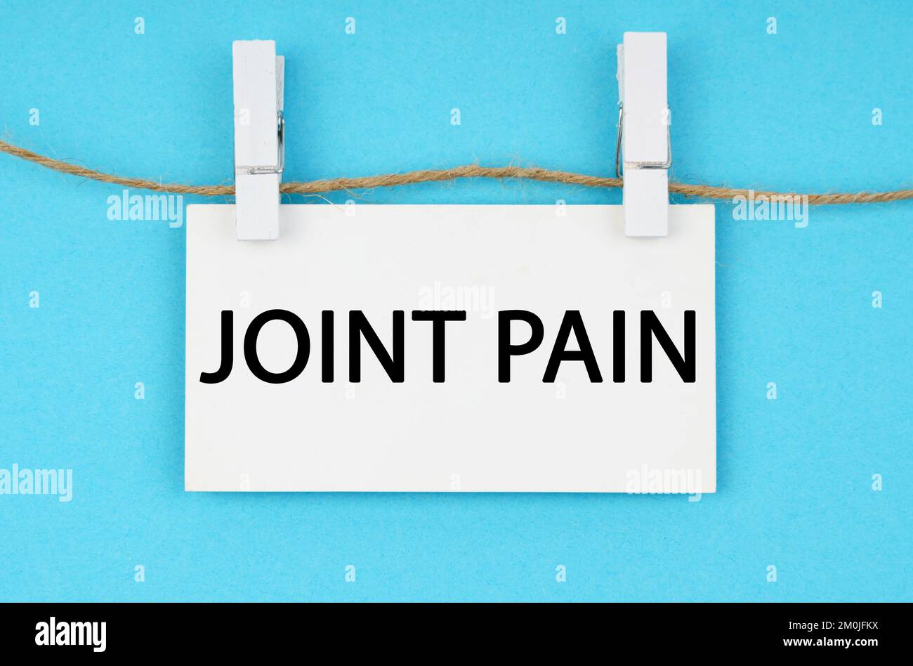 Medicine and health concept. On a blue background, a white plaque hangs ...