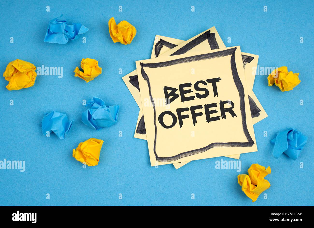 Business concept. On a blue background, there are pieces of paper and a ...