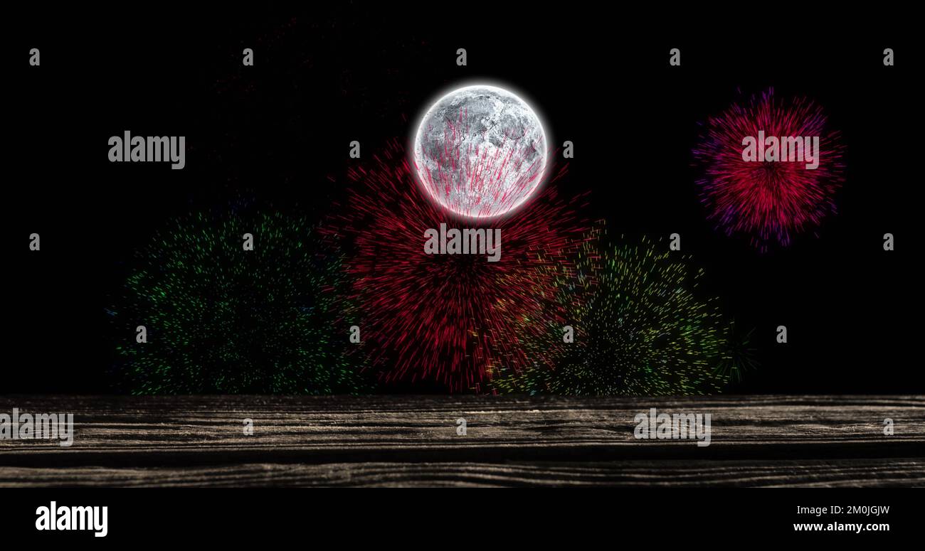 Image of full moon with colourful christmas and new year fireworks ...