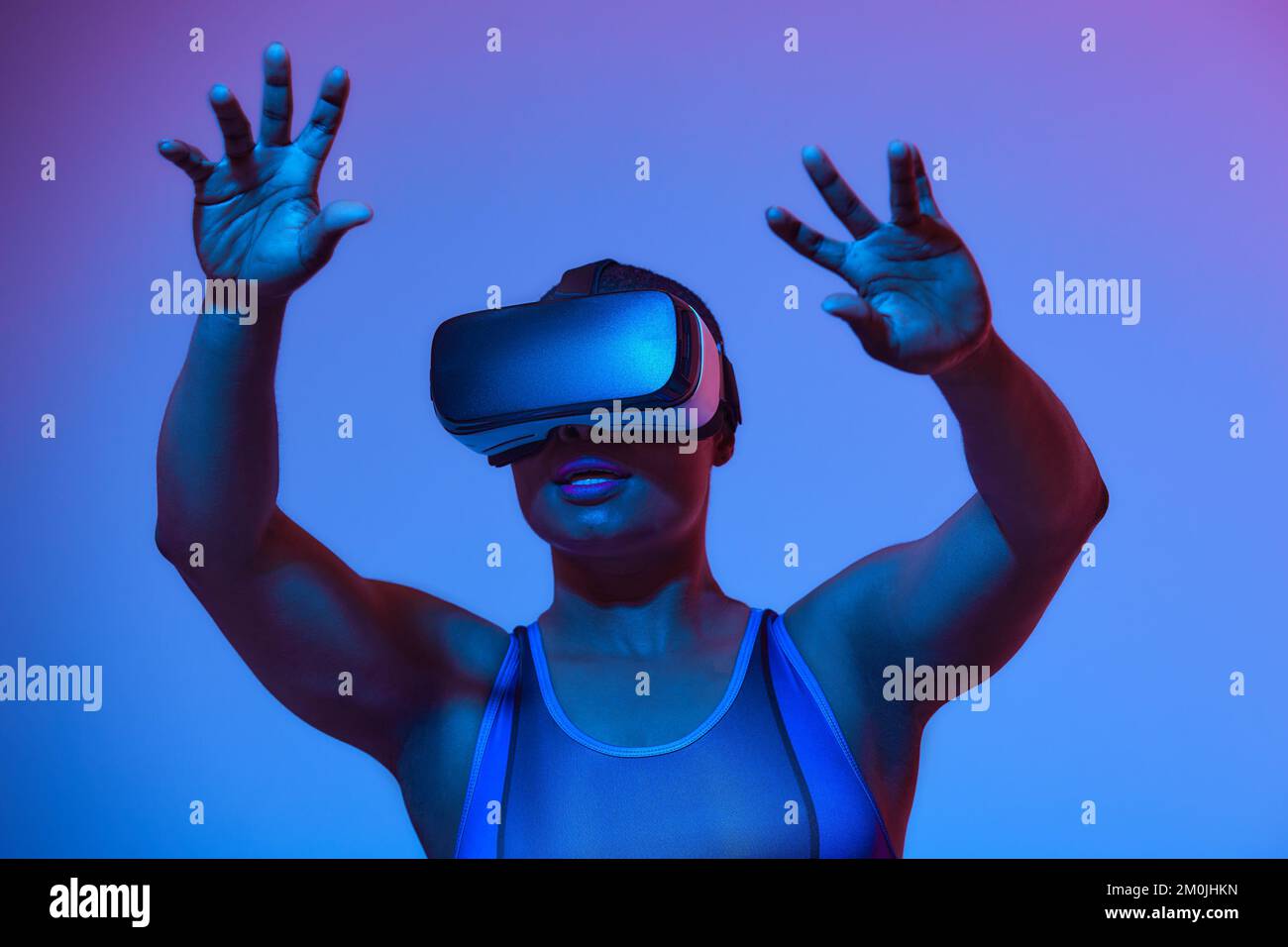 African american woman streamer playing video game using virtual ...