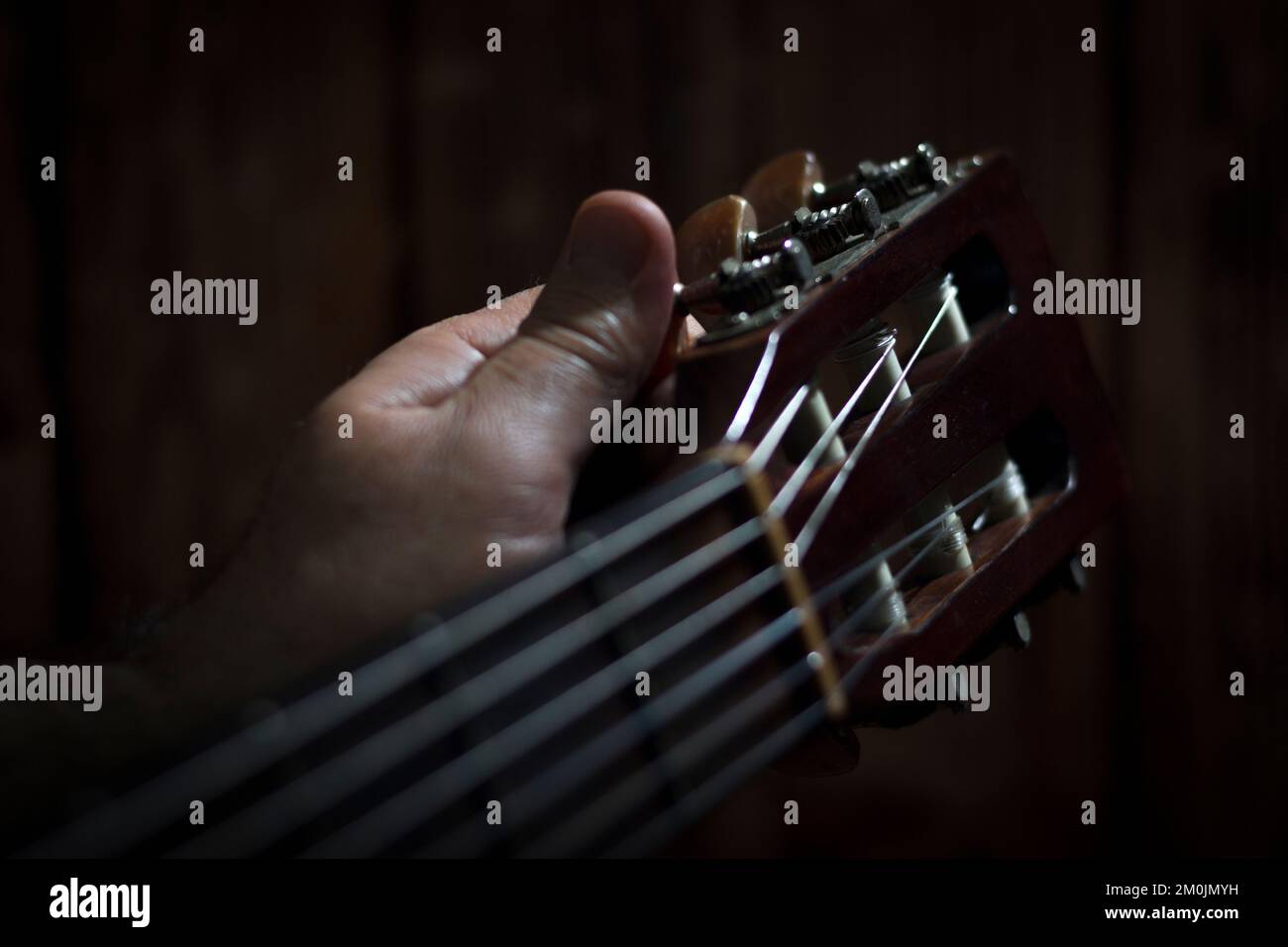 Guitarist tuning his guitar and getting ready to go on stage Stock ...