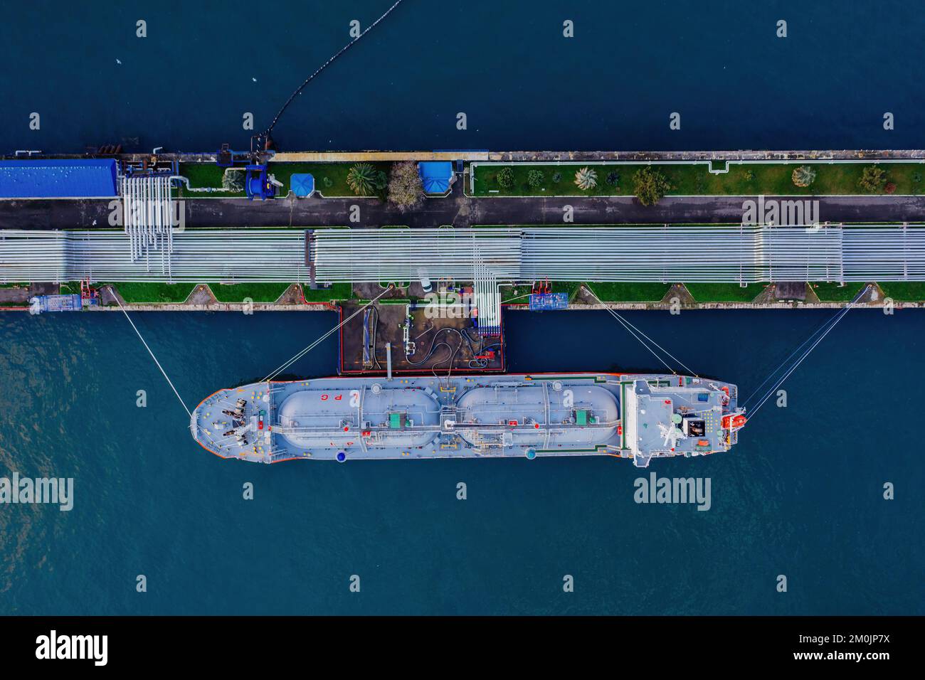 Ship tanker with LPG. Process of loading of tanker, drone aerial view ...