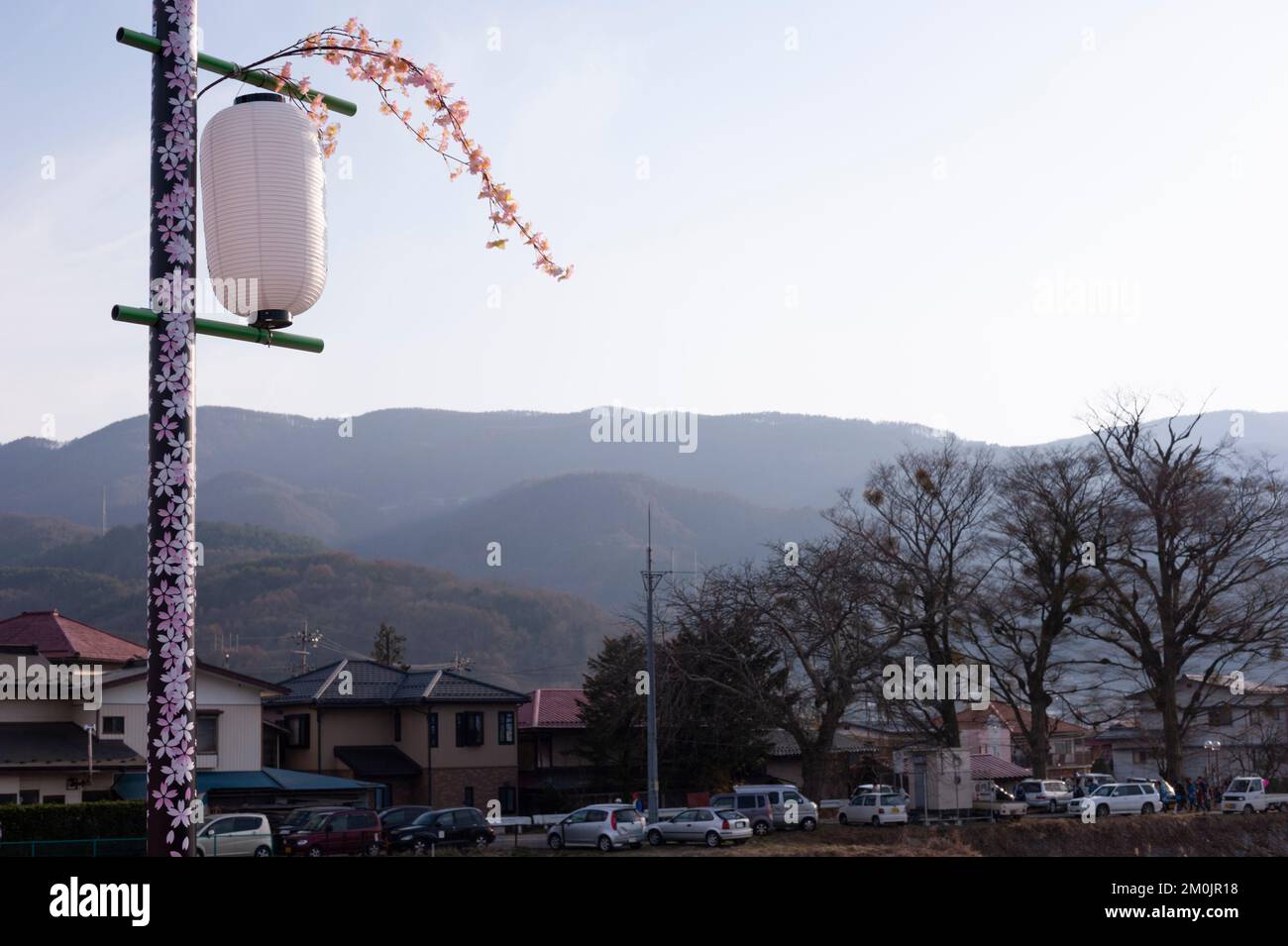 An early spring day in Chino, Nagano, Japan, with only the light poles ...