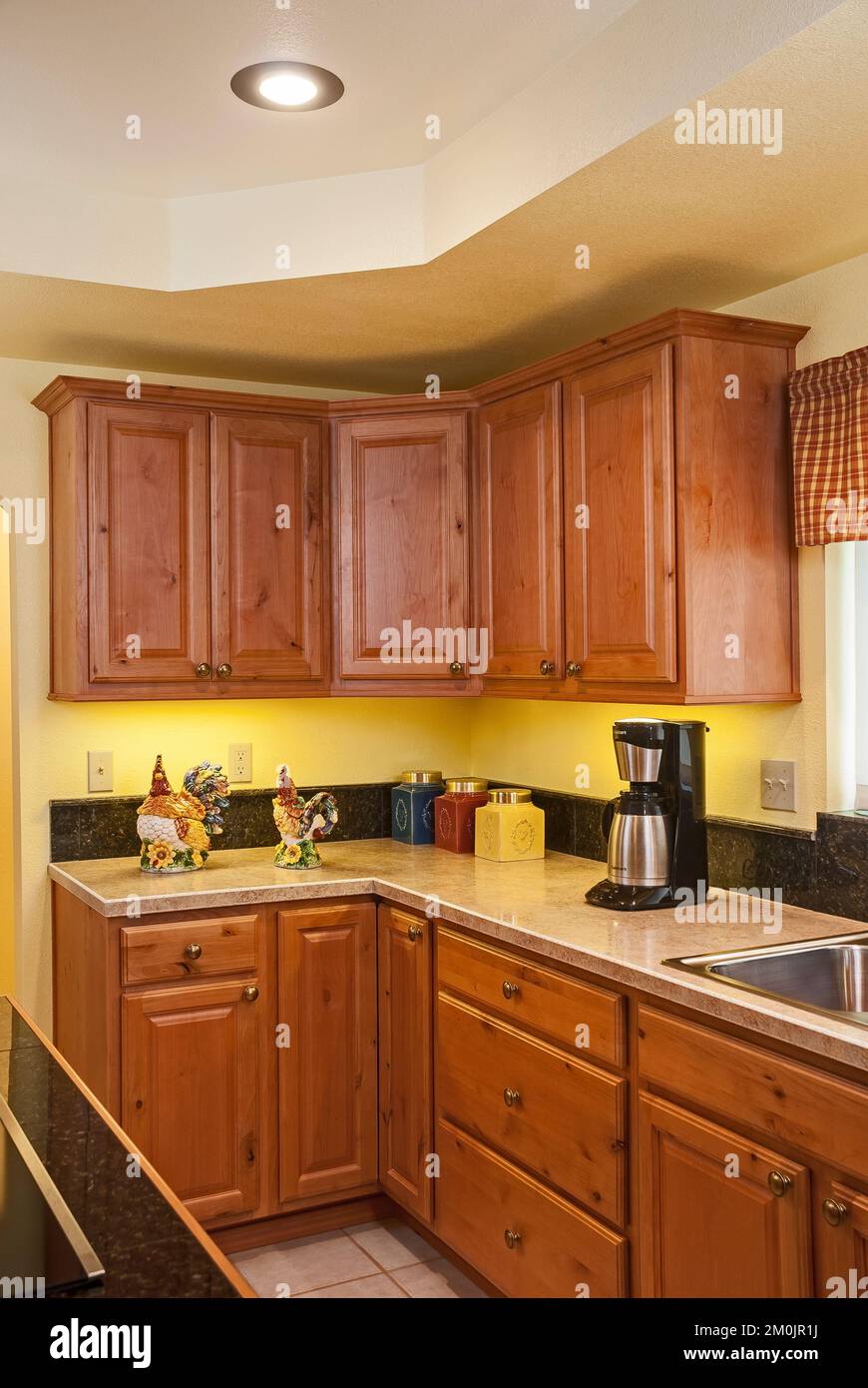 A corner setting in a very nice contemporary modern kitchen with wooden ...