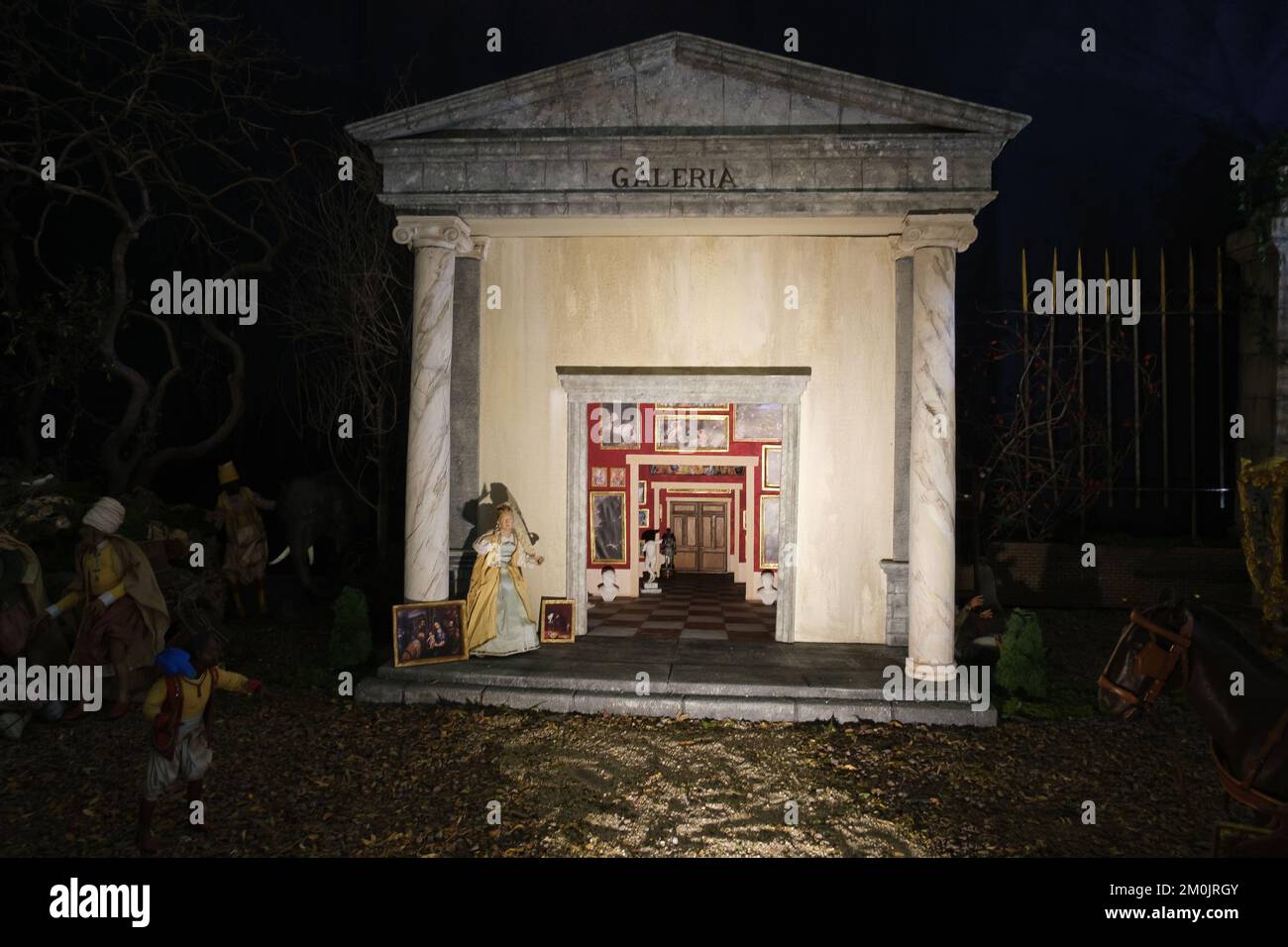 Various figures representing a scene from an art gallery are shown in ...