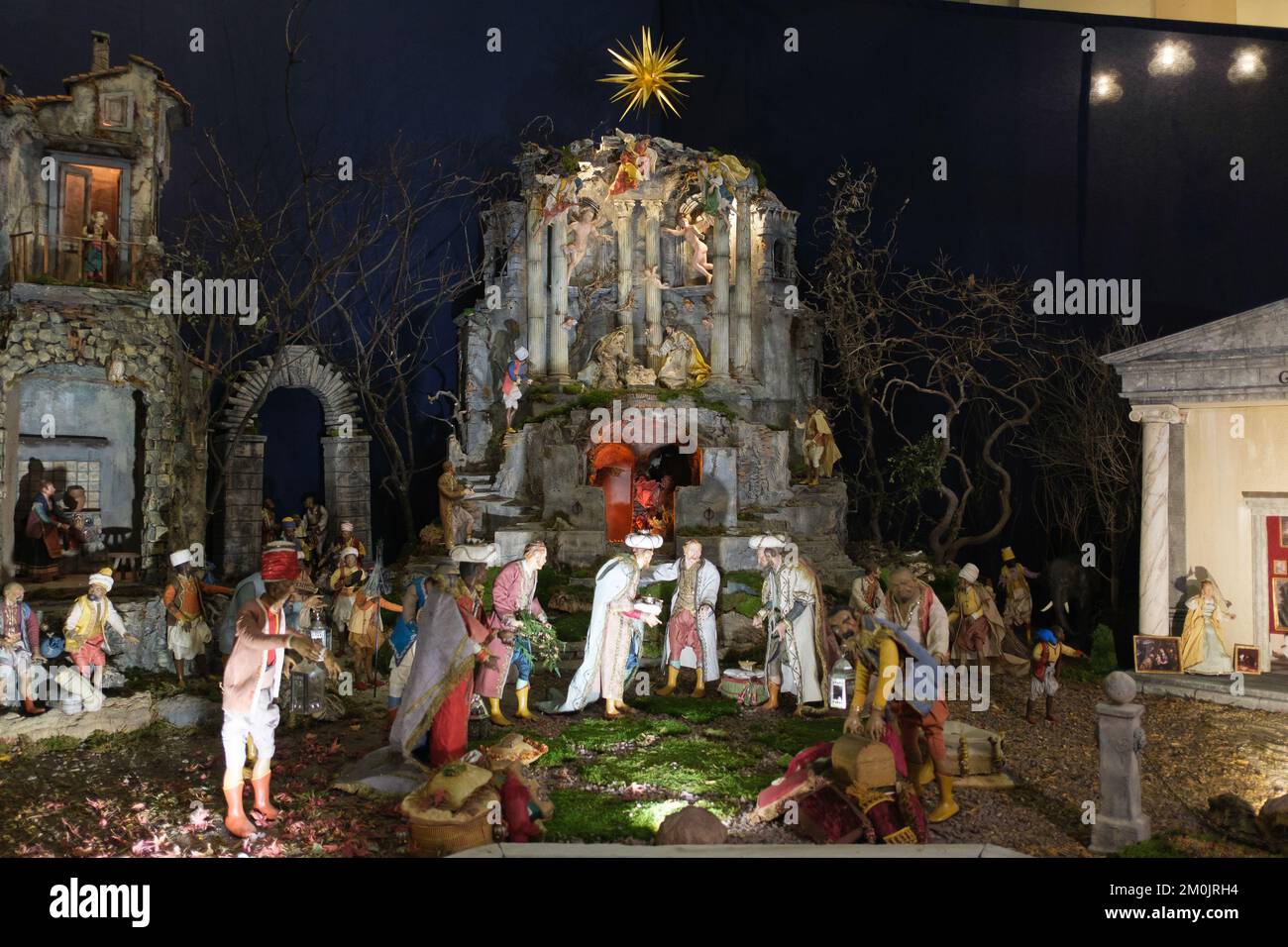 several figures representing a scene of the birth of Christ are shown ...
