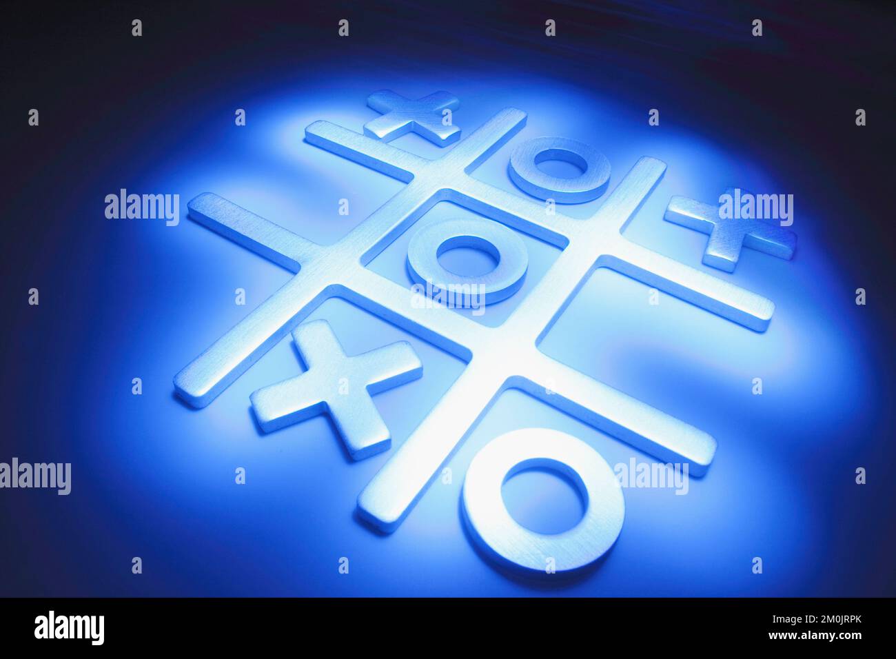 Tic Tac Toe on Blue Background Stock Photo - Alamy