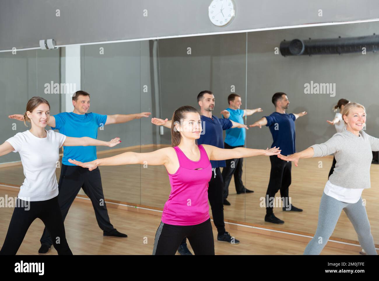 People stretching before dance training Stock Photo - Alamy