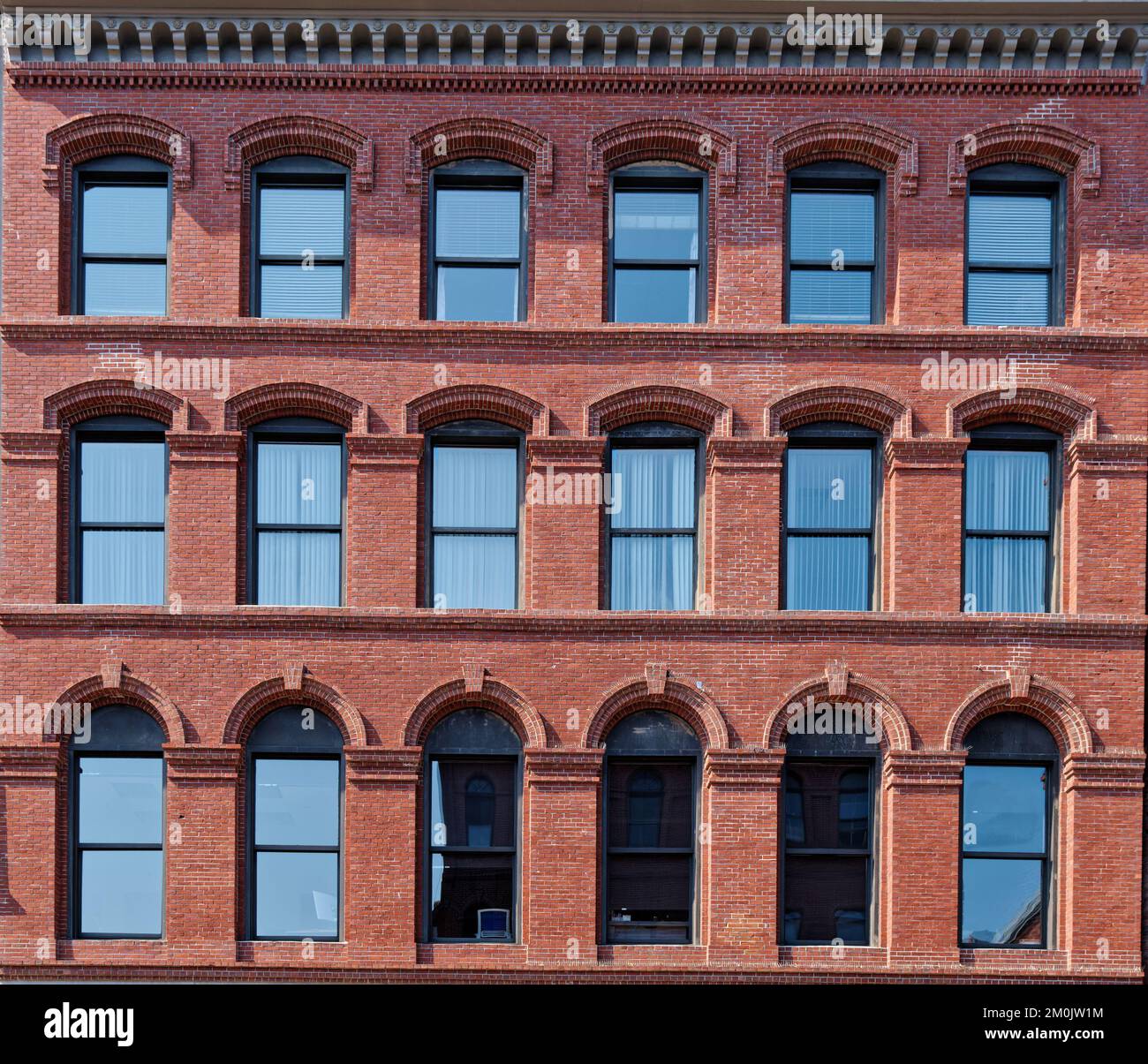 Old brick building arched windows hi-res stock photography and images ...