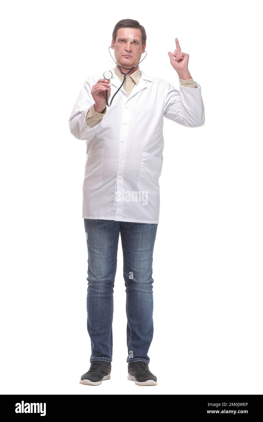 Front view of serious doctor listening to a heartbeat with a ...