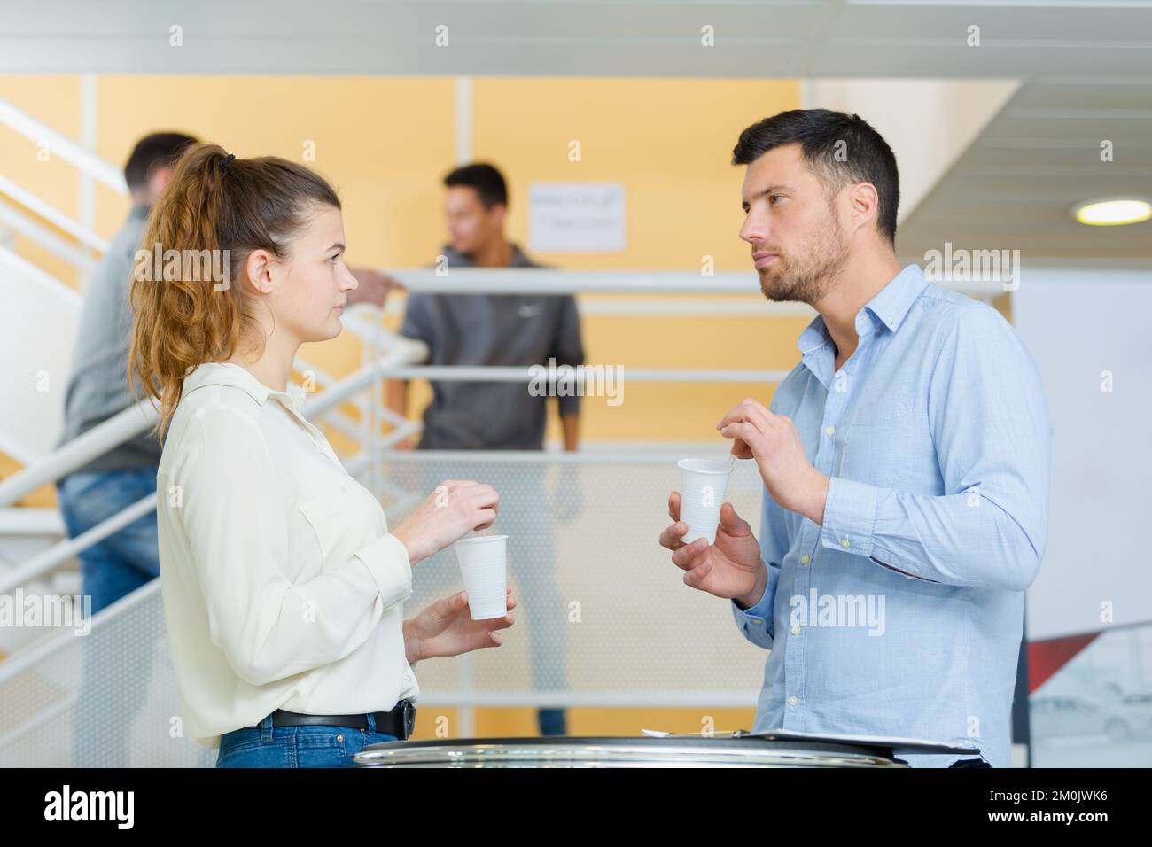 portrait of student talking to teacher Stock Photo - Alamy