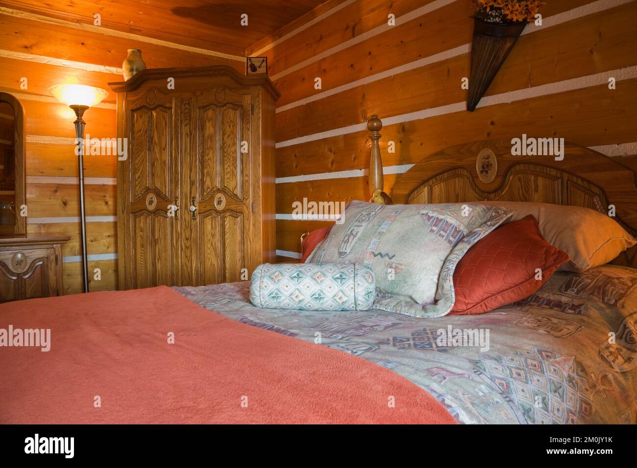 Antique wooden bed and armoire in upstairs bedroom inside 1978 built ...
