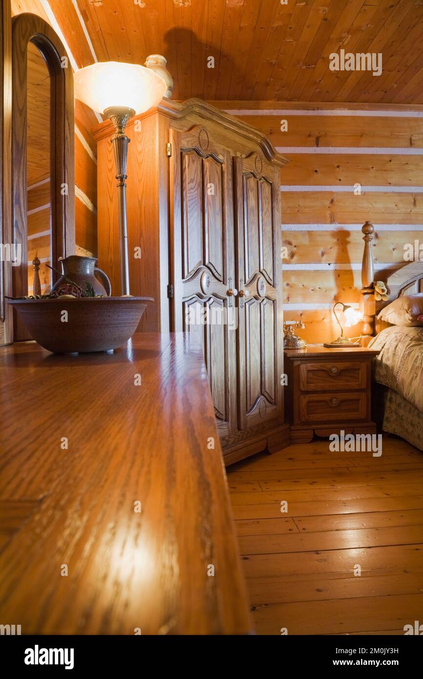 Antique wooden dresser and armoire in bedroom inside 1978 built replica ...