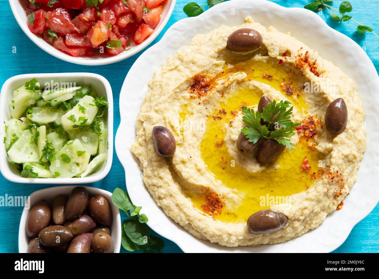 Traditional hummus with vegetables from above Stock Photo - Alamy