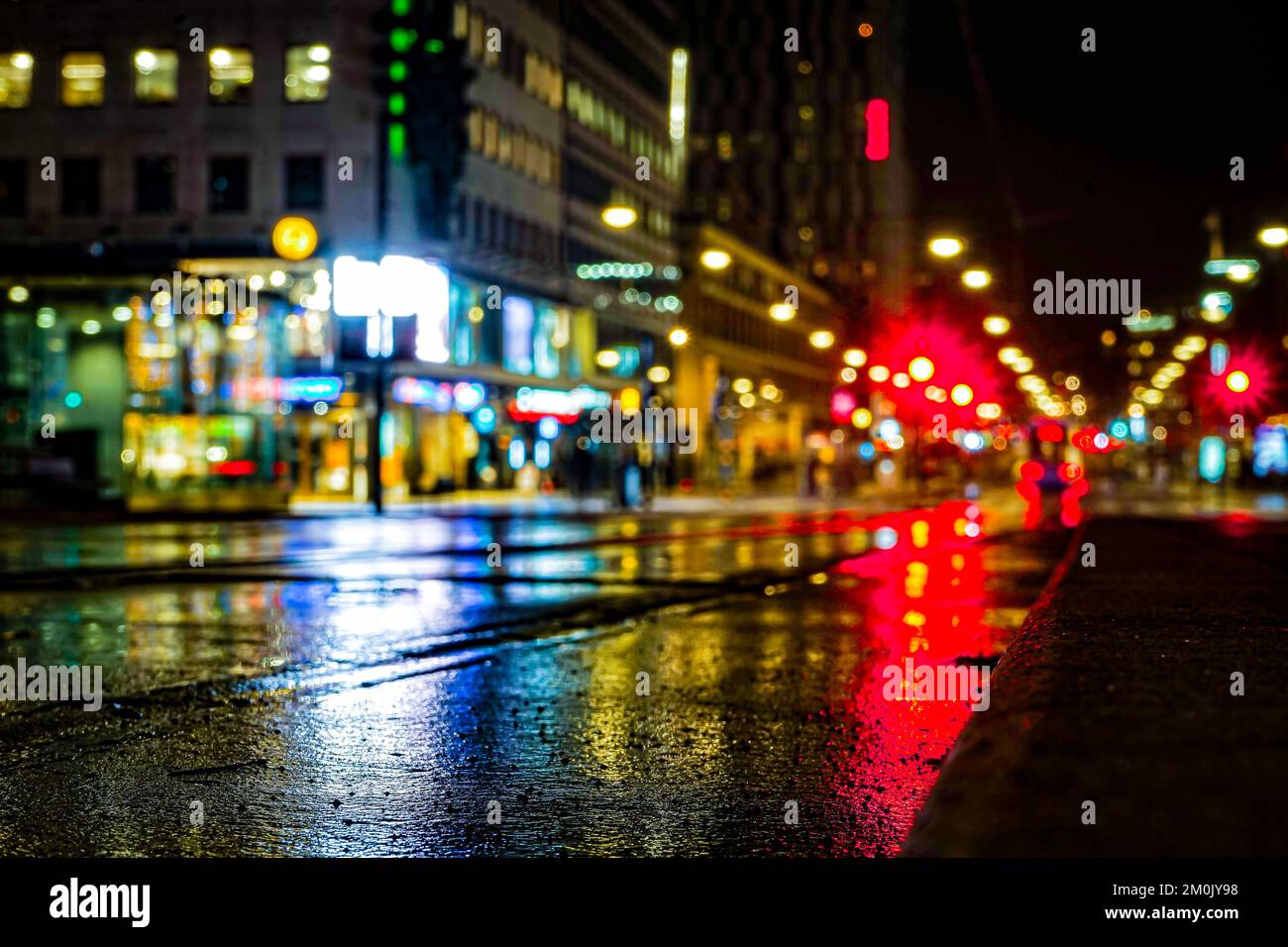 View of wet city street at night Stock Photo - Alamy