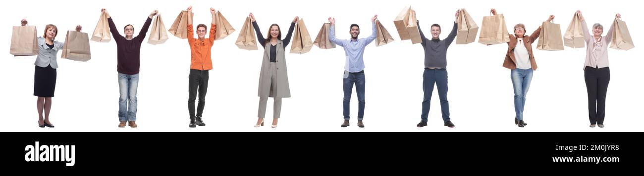 a group of people are running paper shopping bags Stock Photo - Alamy