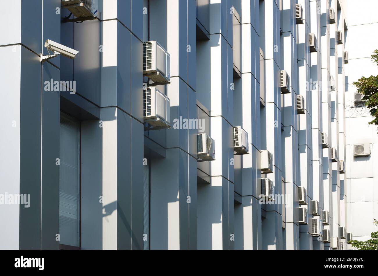 Many HVAC air conditioning and ventilation systems on wall. Outdoor Air ...