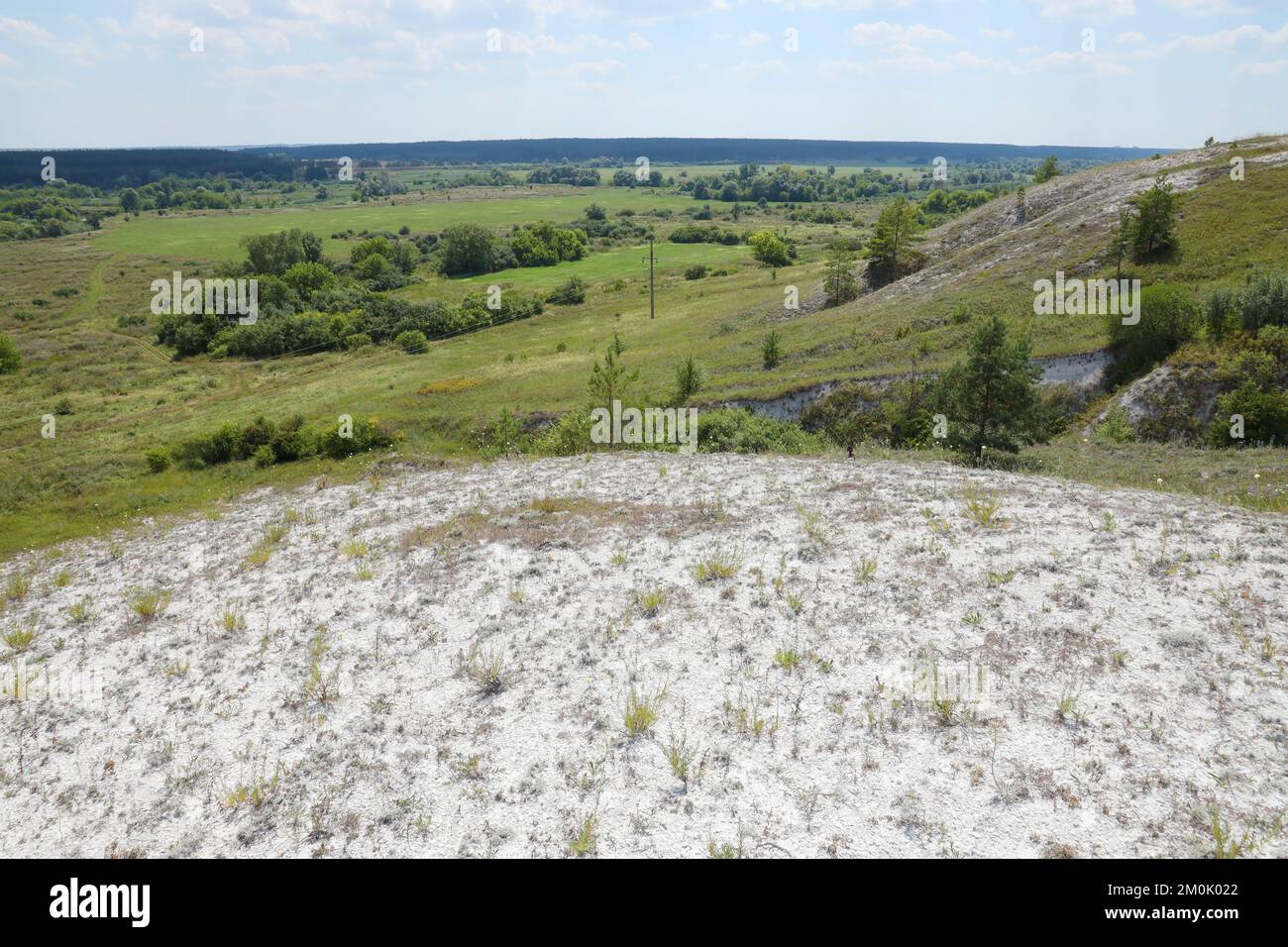 Ancient multimillion chalk mountains on the steppe surface of earth ...