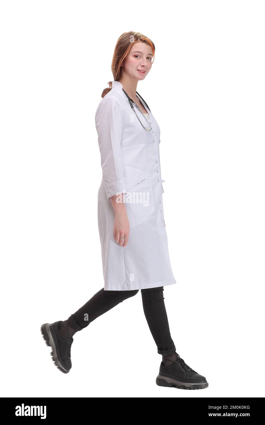 female doctor walking towards the camera smiling isolated Stock Photo ...