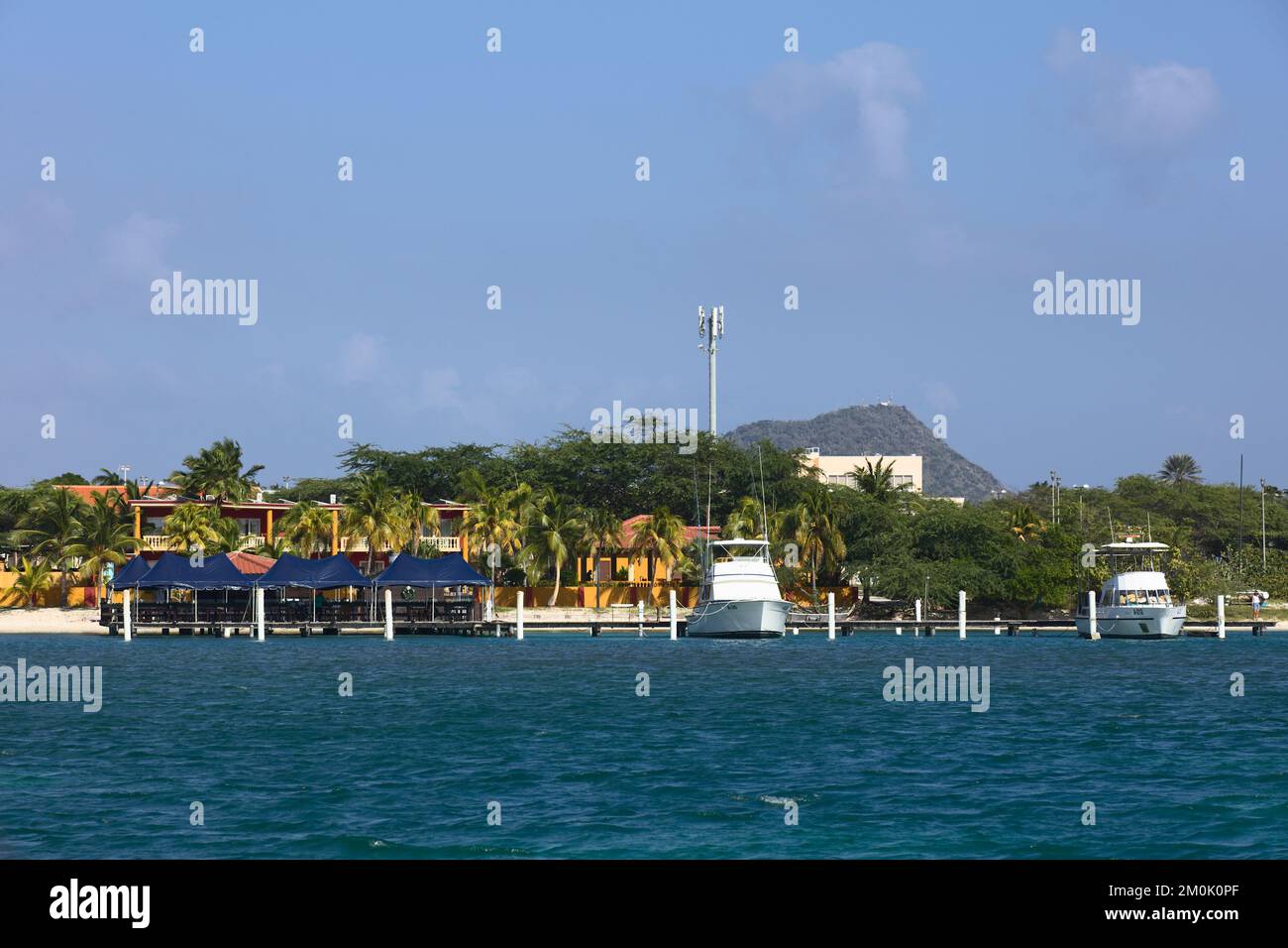 ORANJESTAD, ARUBA - DECEMBER 07, 2021: Pier at Surfside Beach with ...