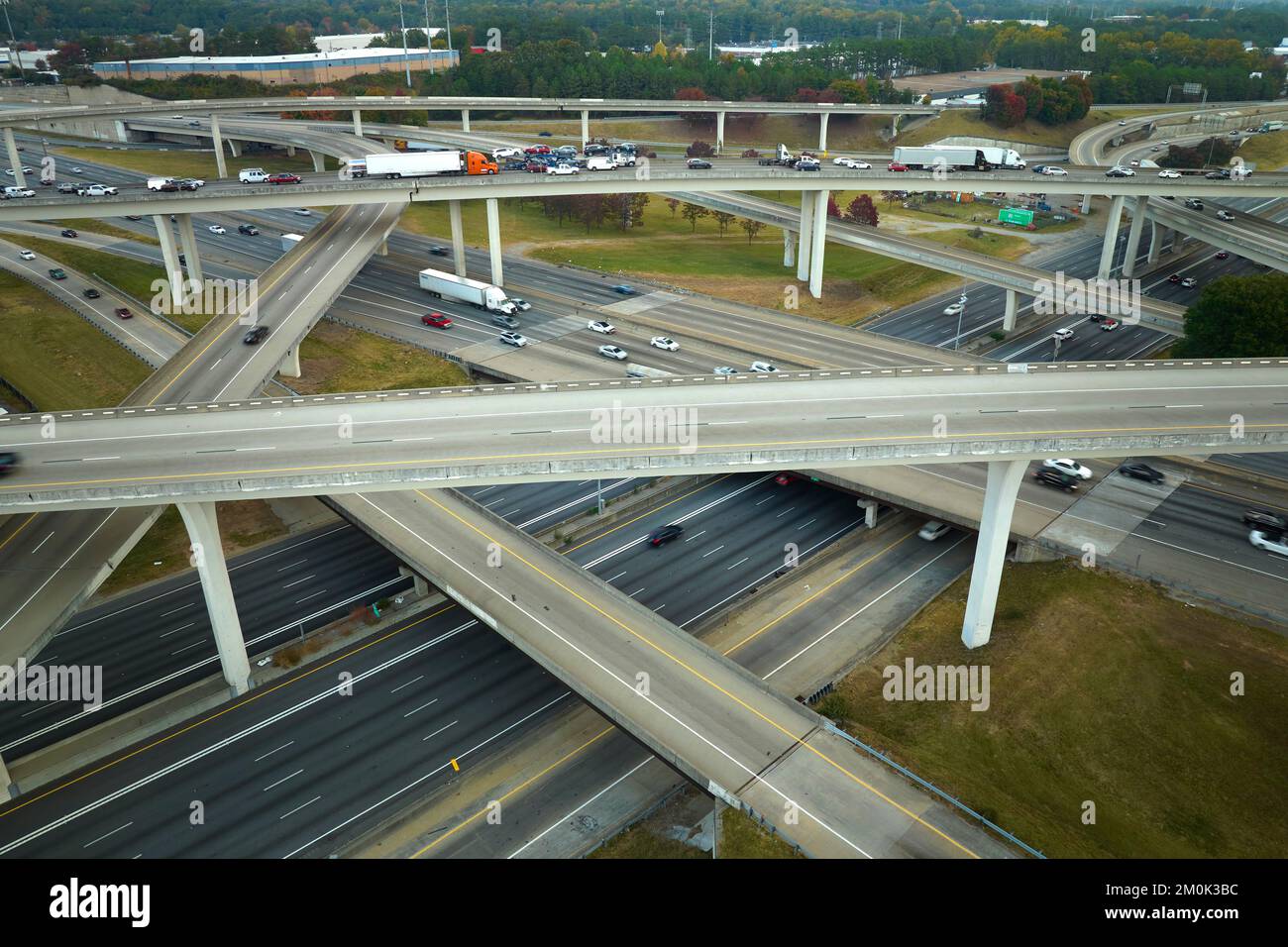Aerial view of american freeway intersection with fast moving cars and ...