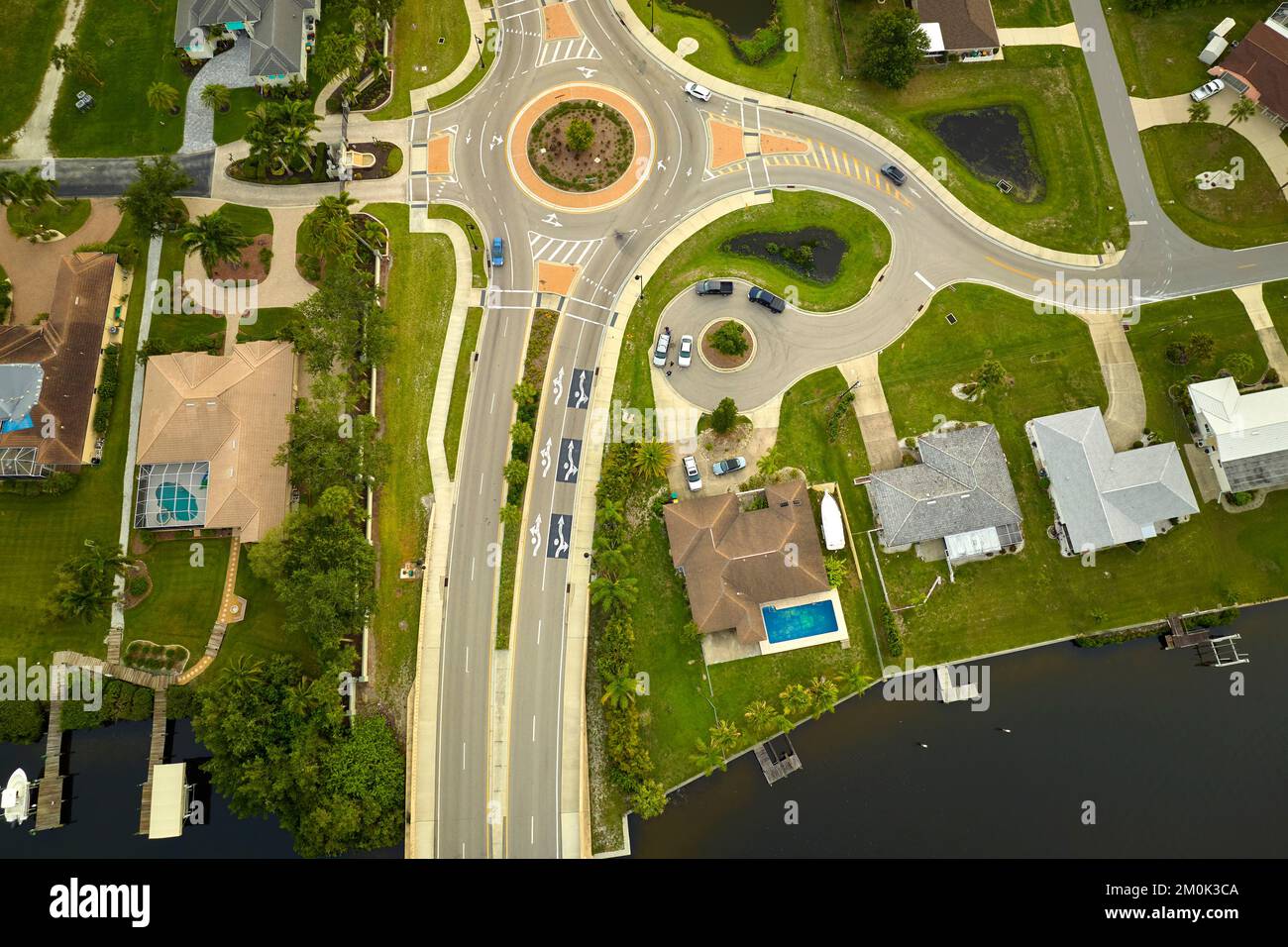 Aerial view of american suburban area with rural road roundabout ...