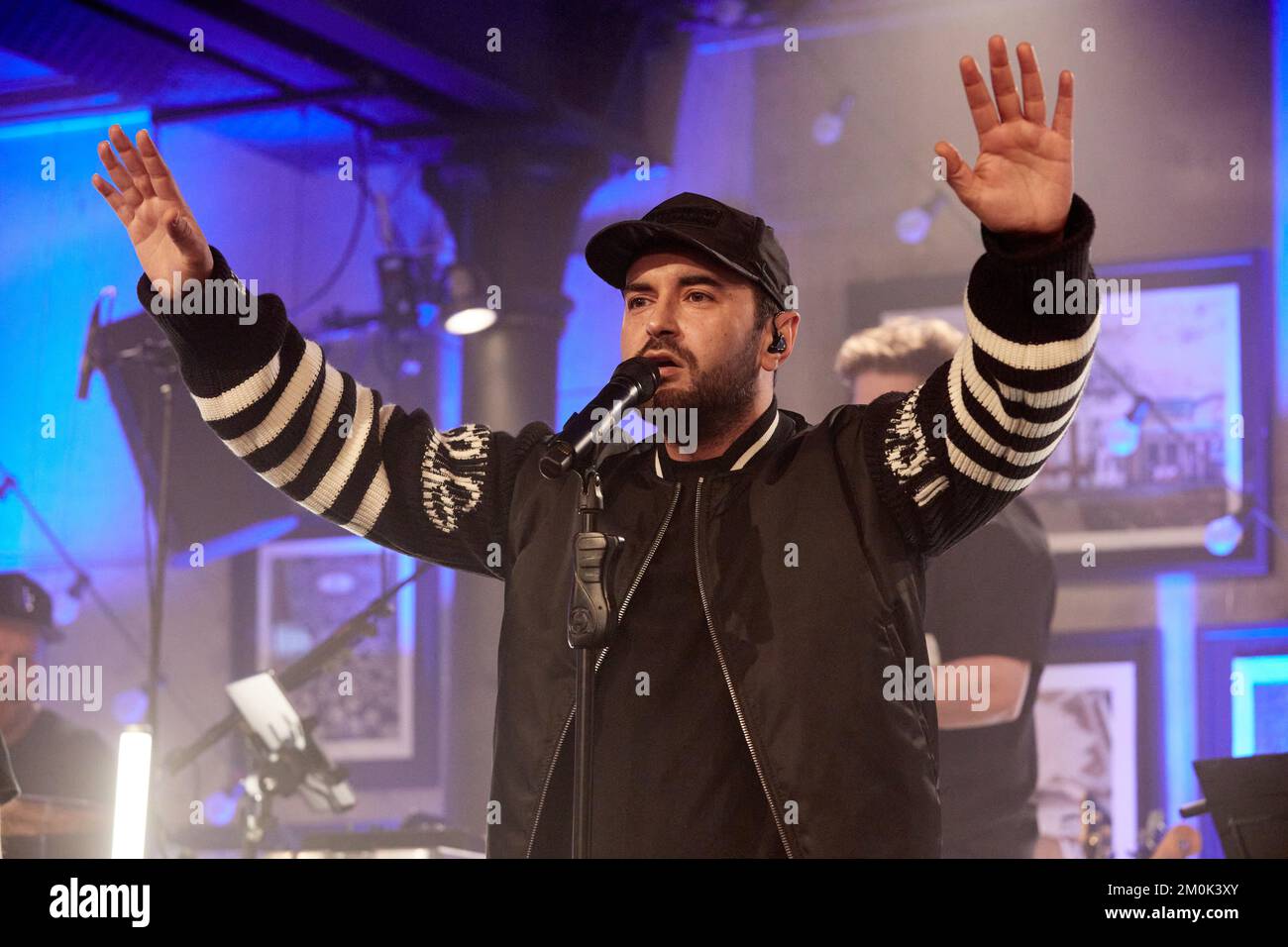 Hamburg, Germany. 06th Dec, 2022. Chefket, rapper, takes the stage at ...