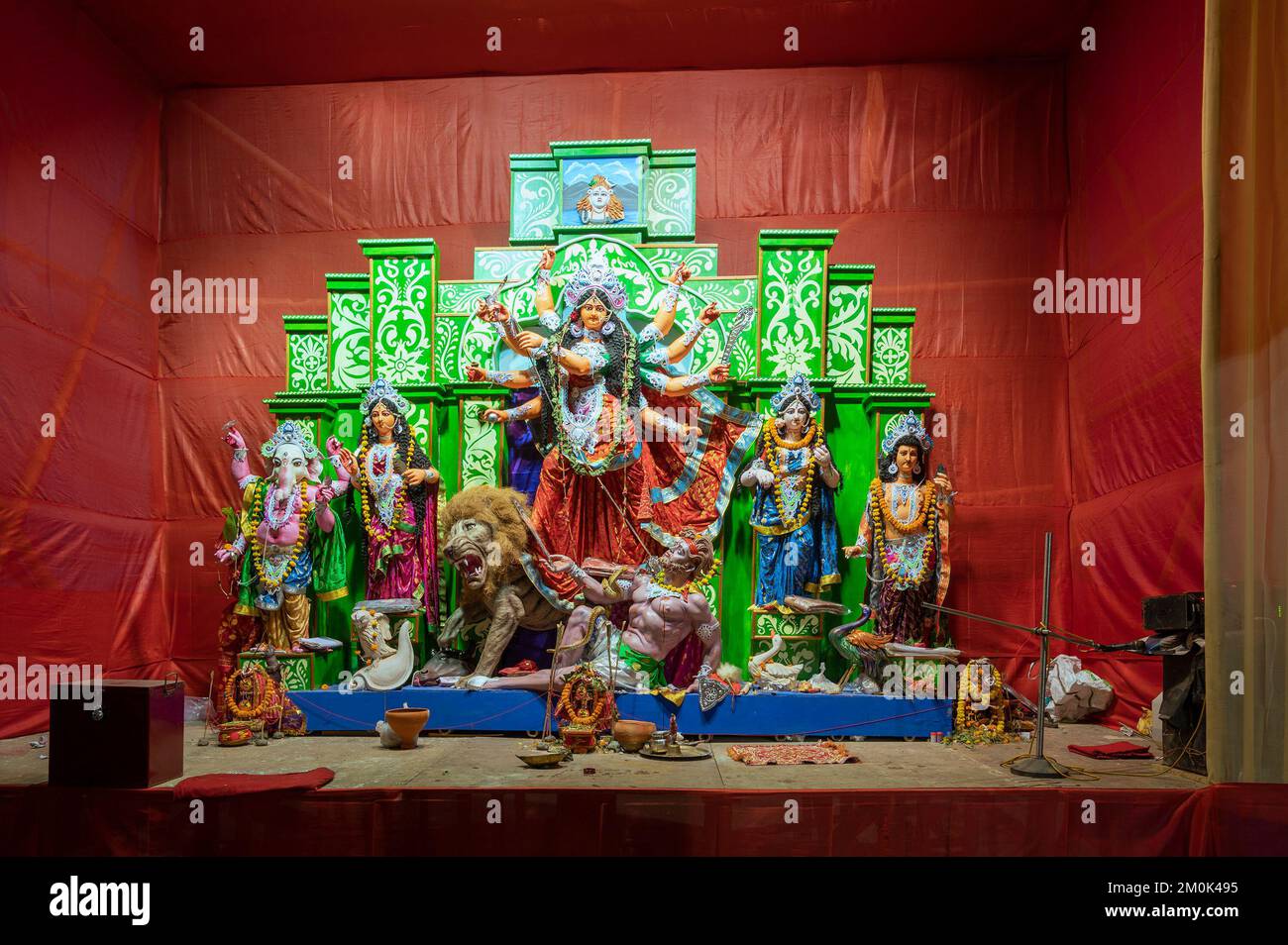 Kolkata, West Bengal, India - 12th October, 2021 : Decorated Durga idol inside pandal at night ...