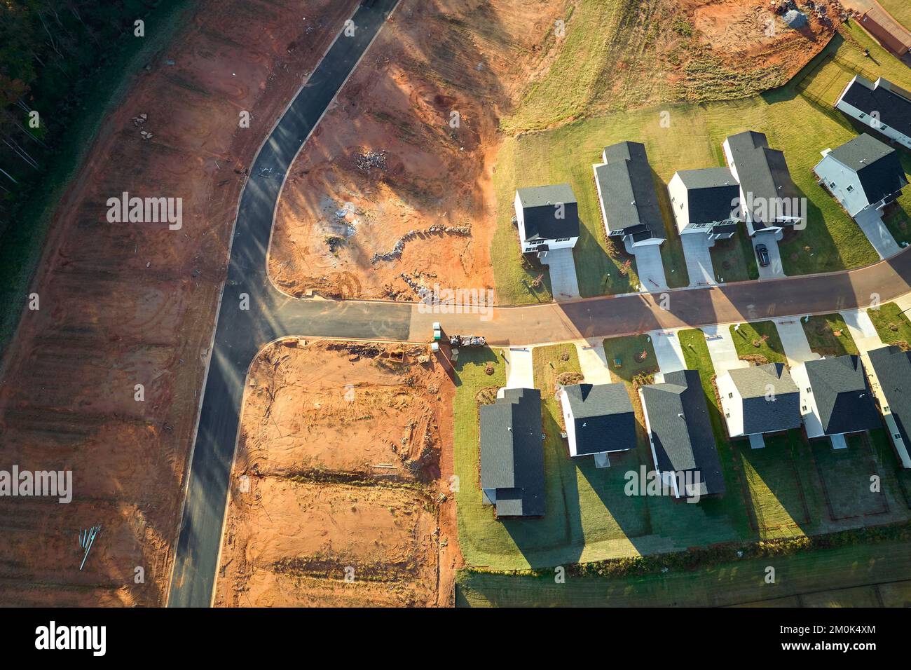 Aerial view of real estate development with tightly located family ...