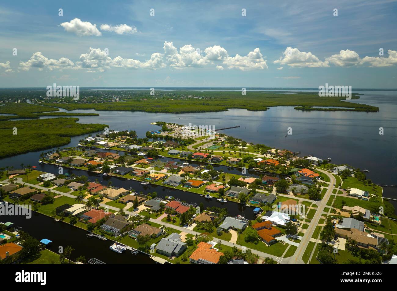 Aerial view of residential suburbs with one storey houses located near ...