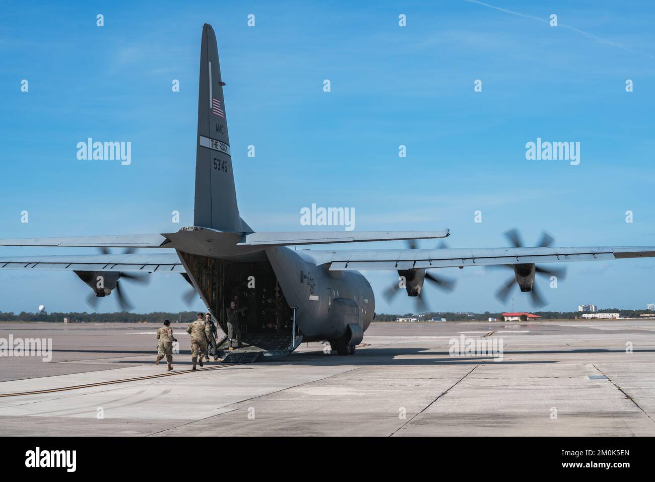 Airmen assigned to the 45th Aeromedical Evacuation Squadron run towards ...