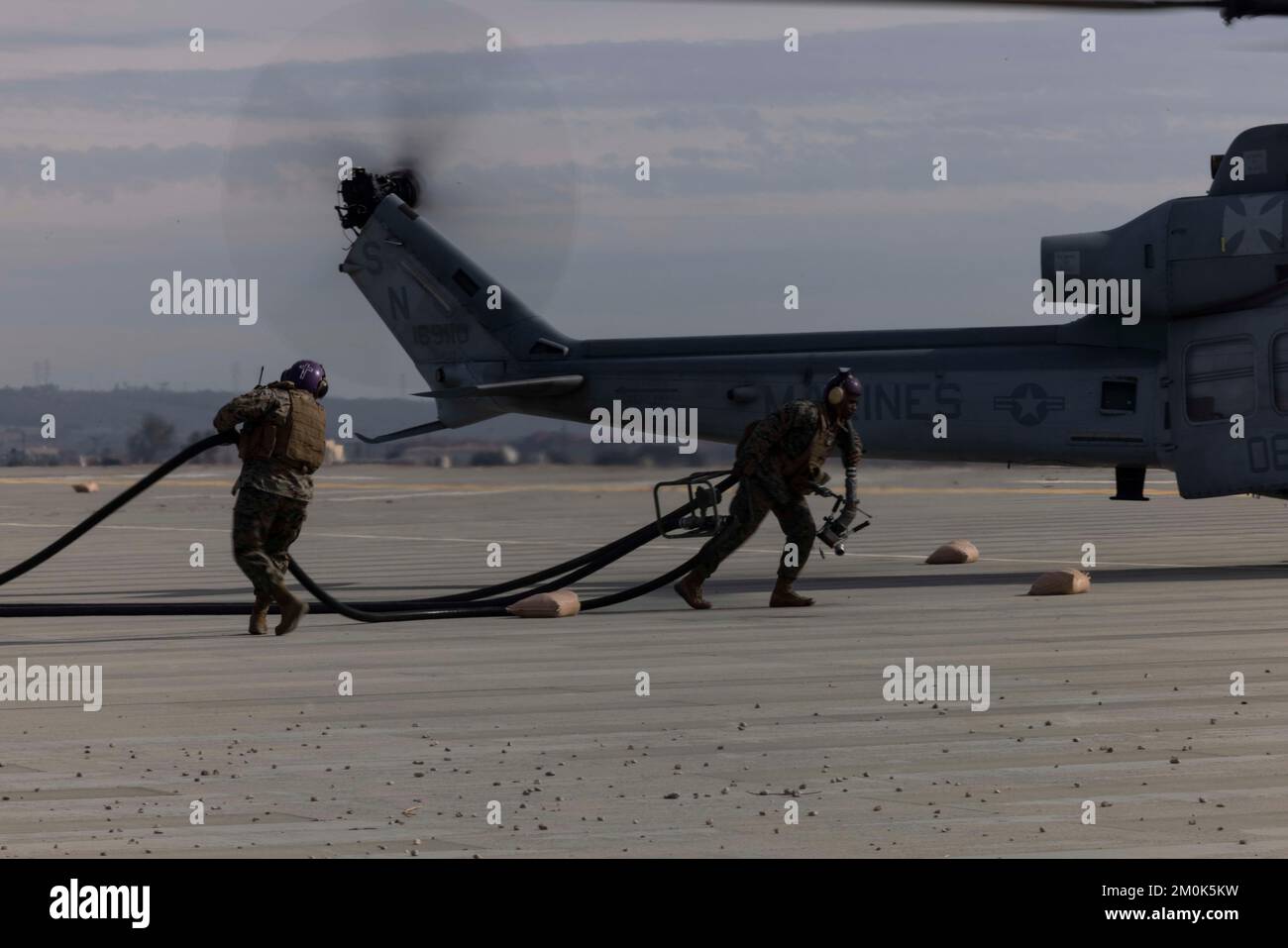 U.S. Marine Corps Sgt. John Williams, left, a line safety ...