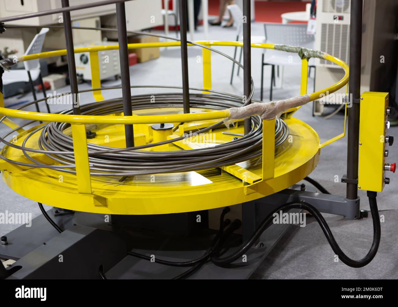 Reel of tube on tube bender machine. Industrial manufacture Stock Photo ...