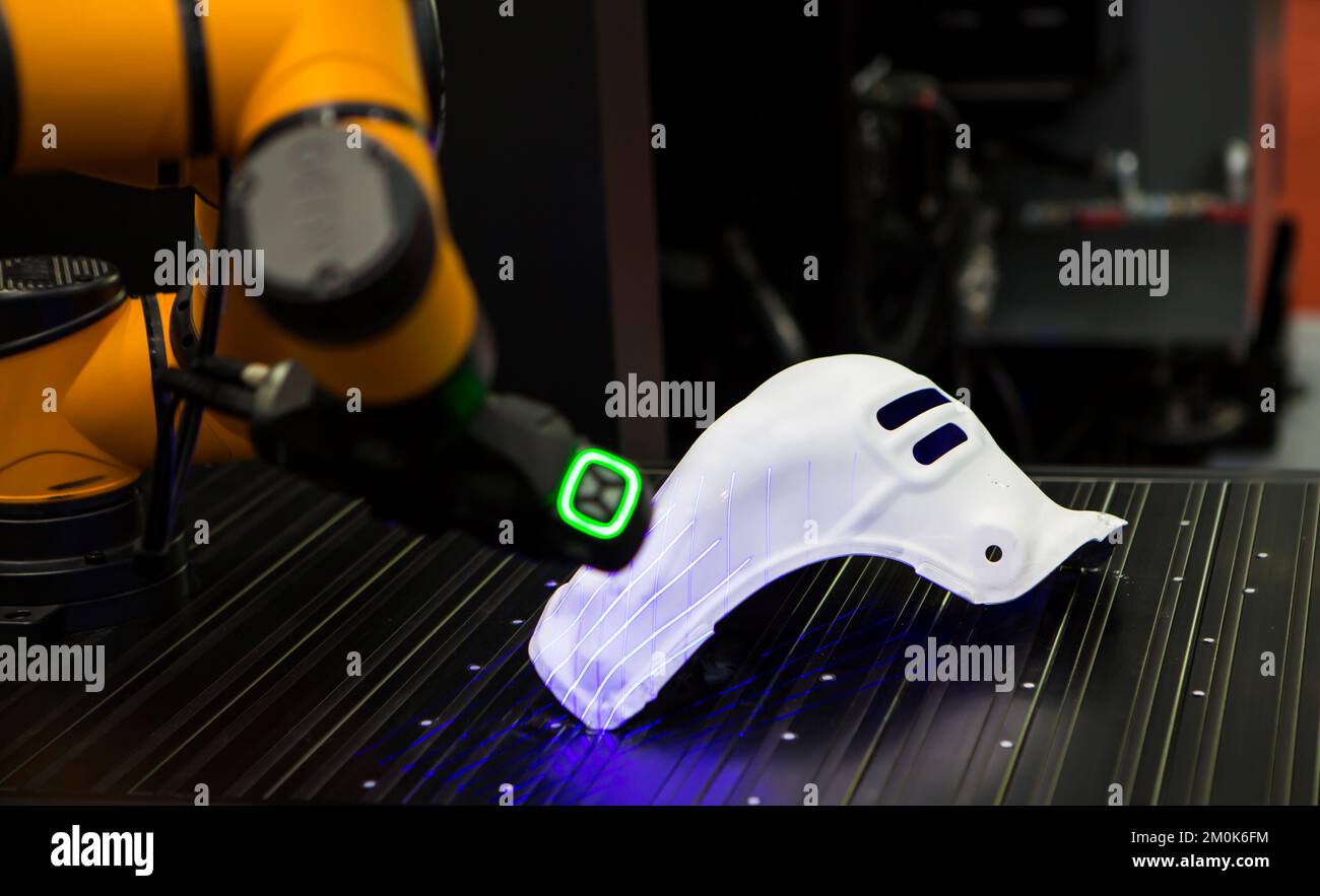 Automated 3D measurement. Robot perform 3D scan on workpiece ...