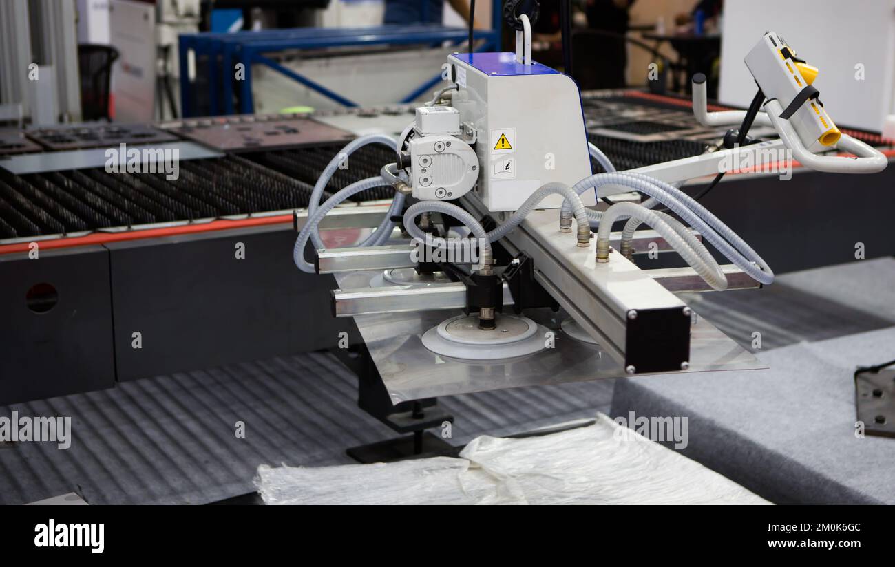 Mechanical vacuum metal sheet lifter loading metal sheet to CNC laser ...