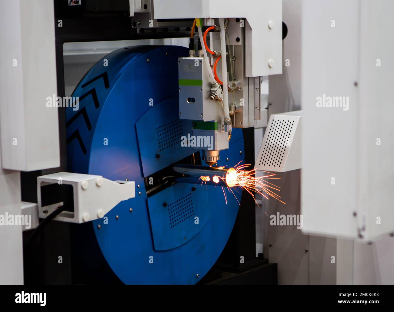 Pipe laser cutting machine. Industrial manufacture Stock Photo - Alamy