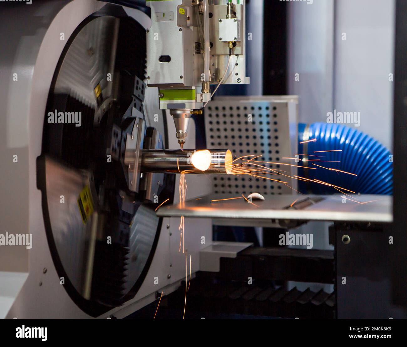 Pipe laser cutting machine. Industrial manufacture Stock Photo - Alamy