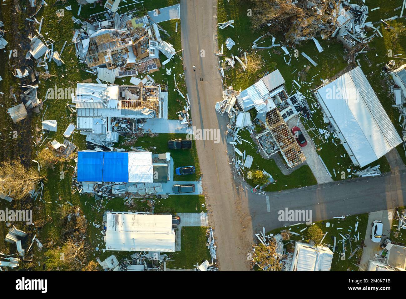 Severely damaged houses after hurricane Ian in Florida mobile home ...