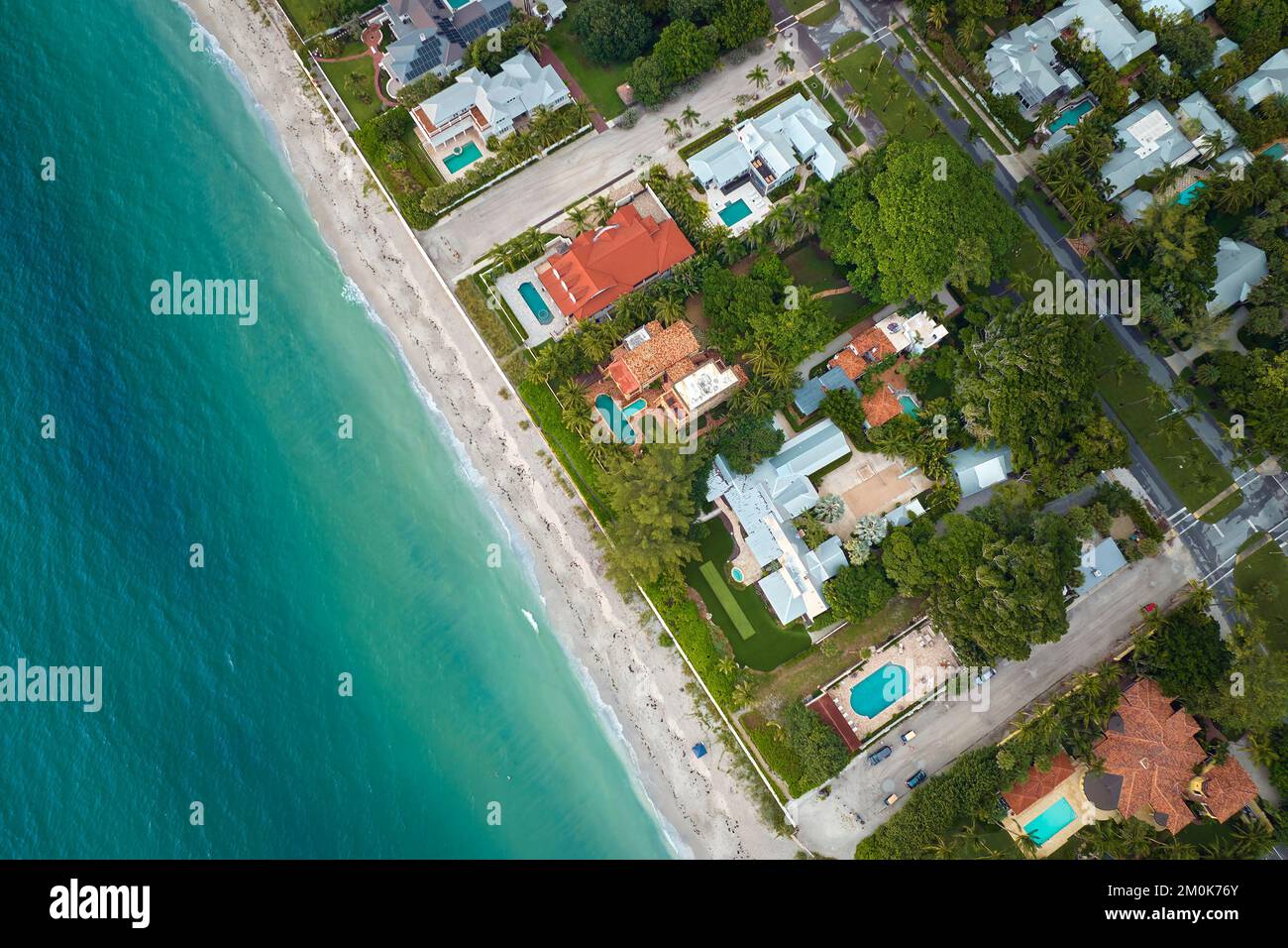 View from above of large residential houses in island small town Boca ...
