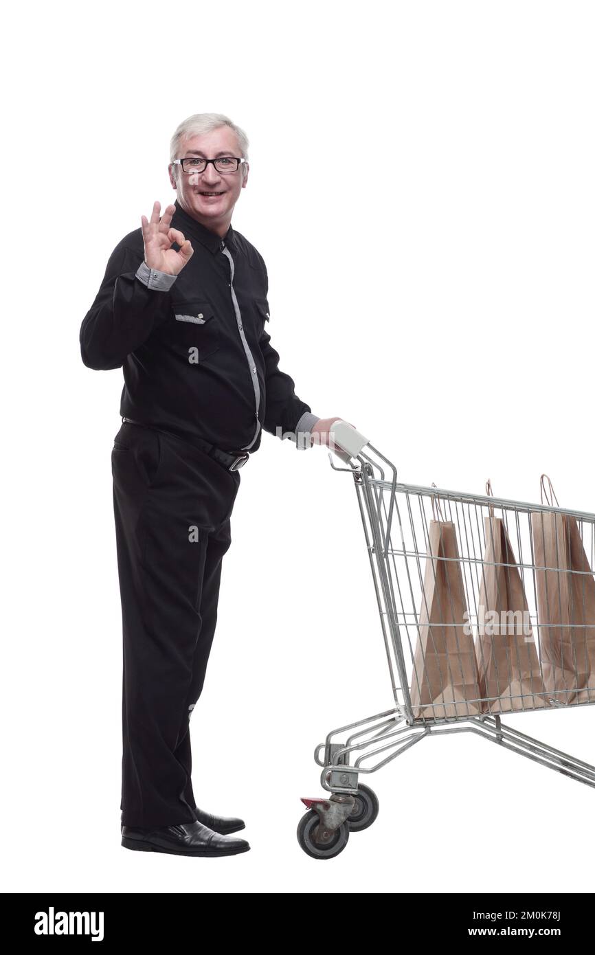 in full growth. happy old man with a shopping cart Stock Photo - Alamy