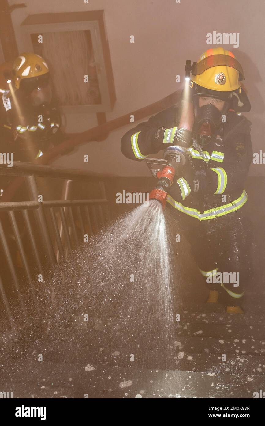 TAIZHOU, CHINA - DECEMBER 7, 2022 - Fire and rescue workers perform an ...