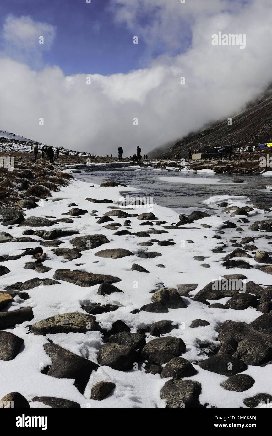 scenic mountain landscape, frozen stream and alpine valley of zero ...