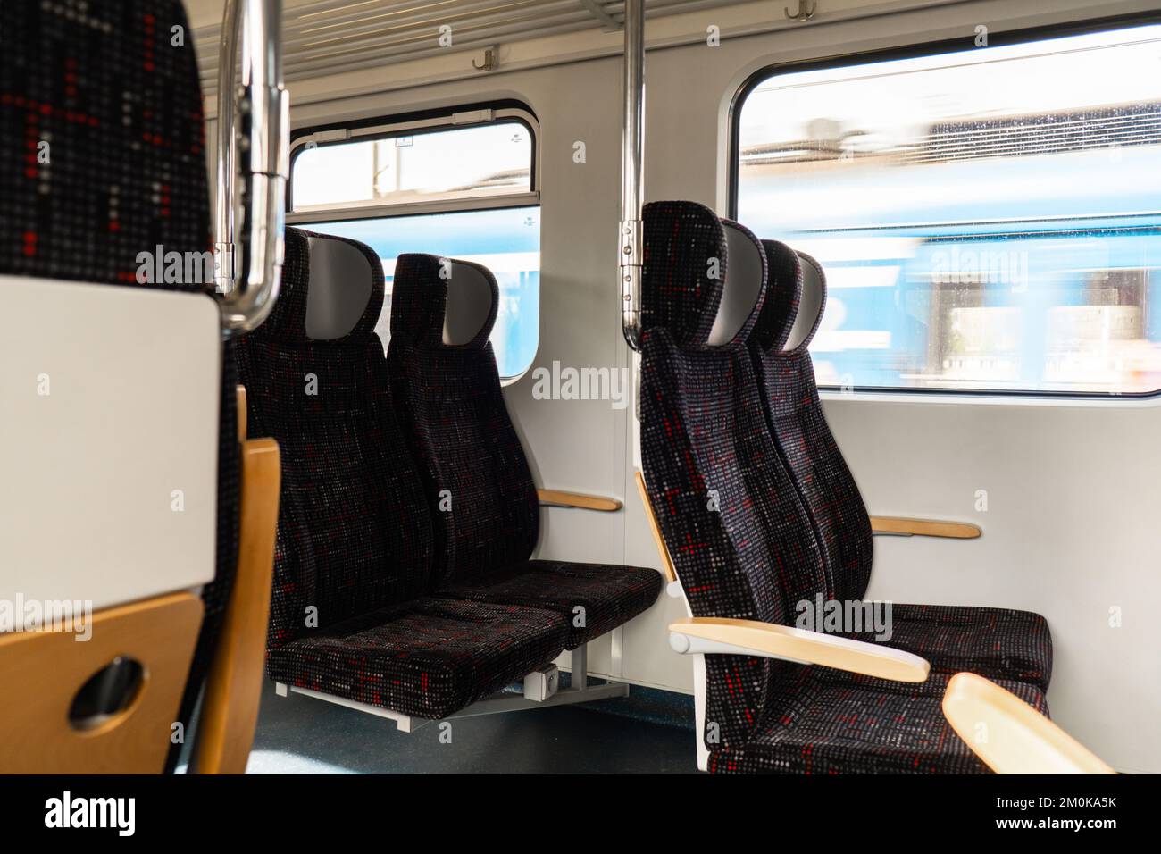 View on railroad track from the window of fast train. Interior view at ...