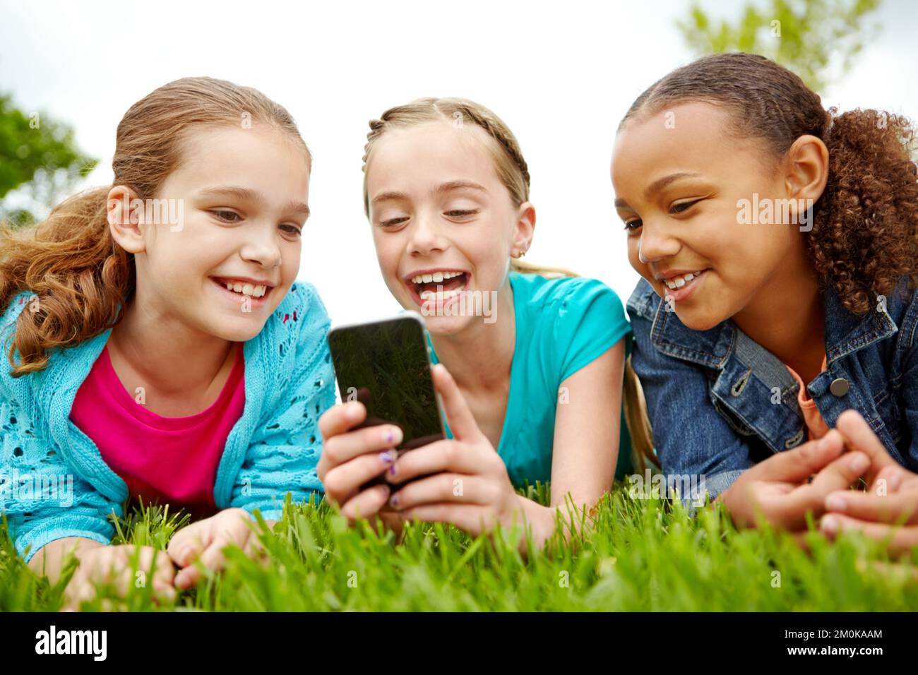 Girl time. Three little girls spending time together and sharing a ...