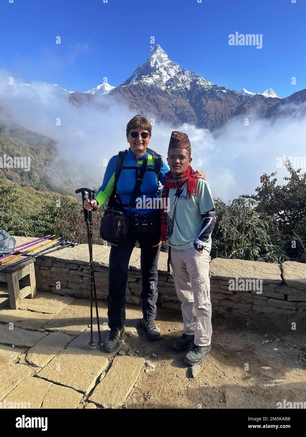Senior female tourist and her guide in Himalaya mountains, Nepal Stock ...